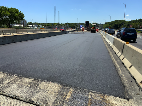 What is a bridge deck overlay and why is it important?